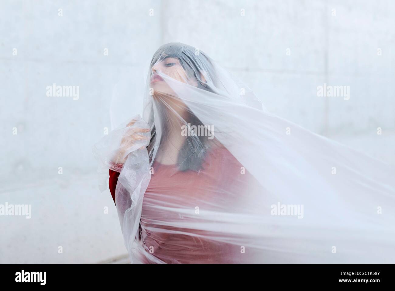Women covered in plastic hi-res stock photography and images - Alamy