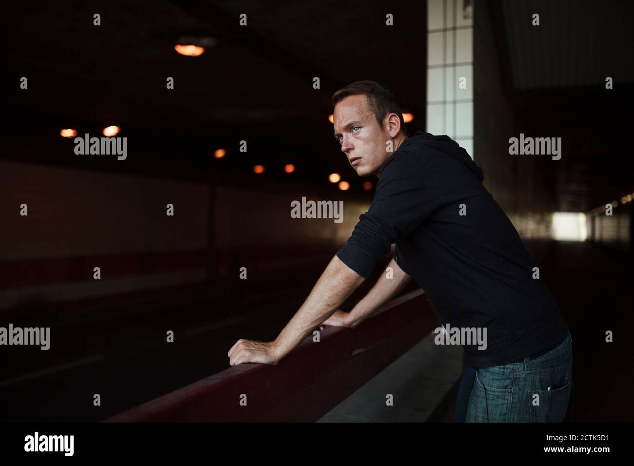 Man leaning on railing hi-res stock photography and images - Alamy