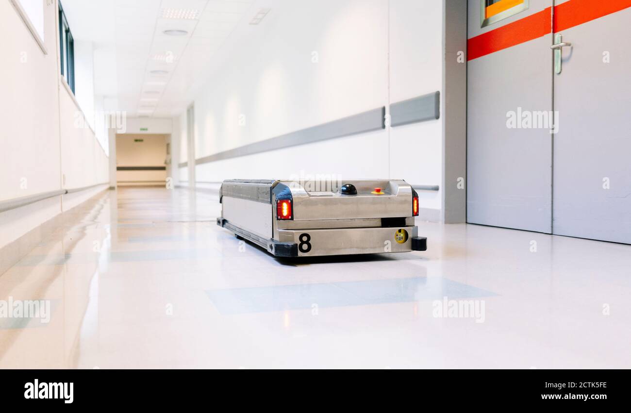 Close-up of robotic trolley on tiled floor in hospital Stock Photo - Alamy