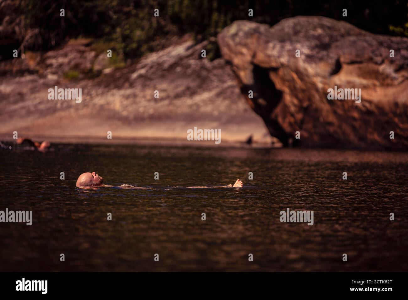 Man floating on river hi-res stock photography and images - Alamy