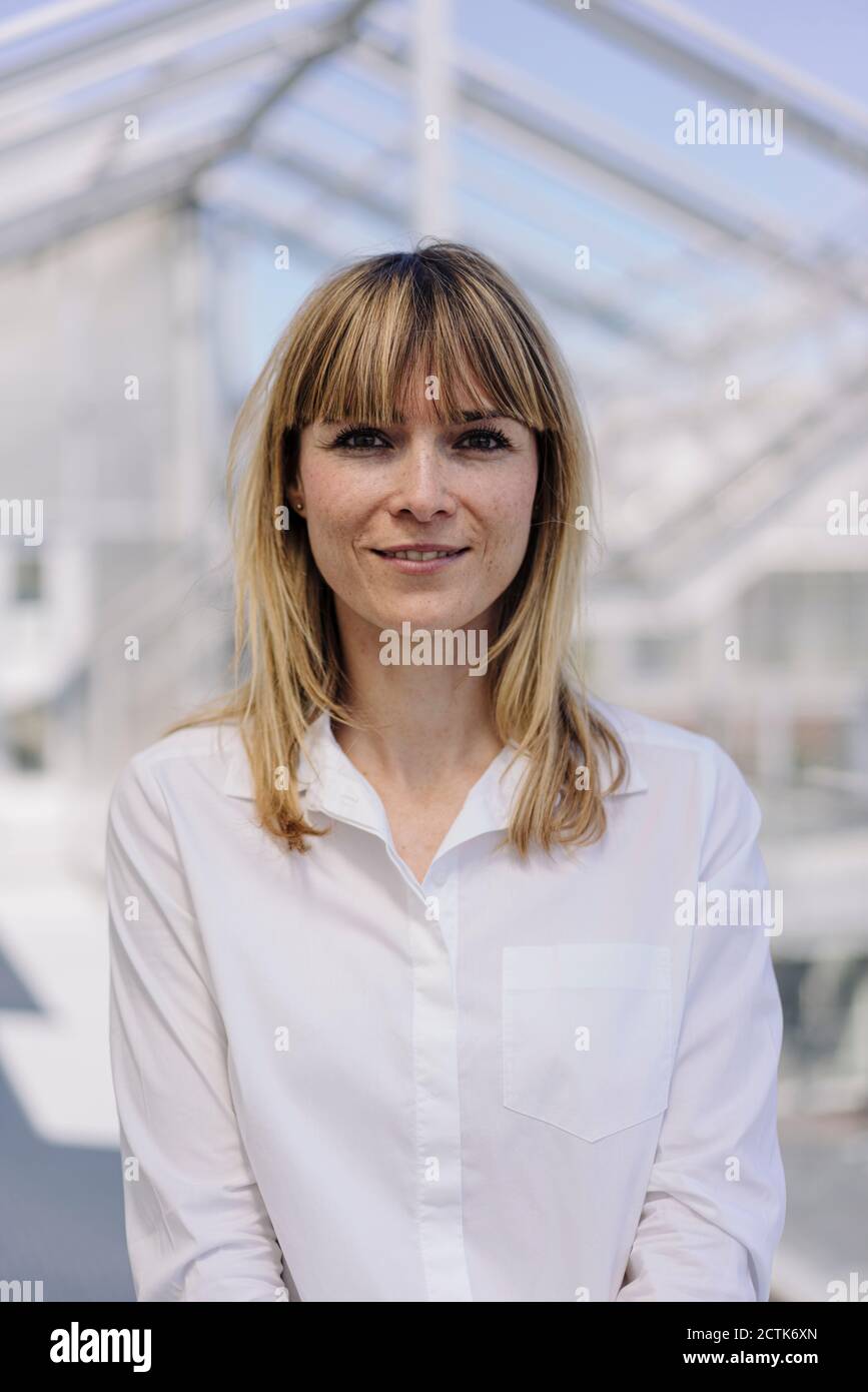 Female professional standing in hi-res stock photography and images - Alamy