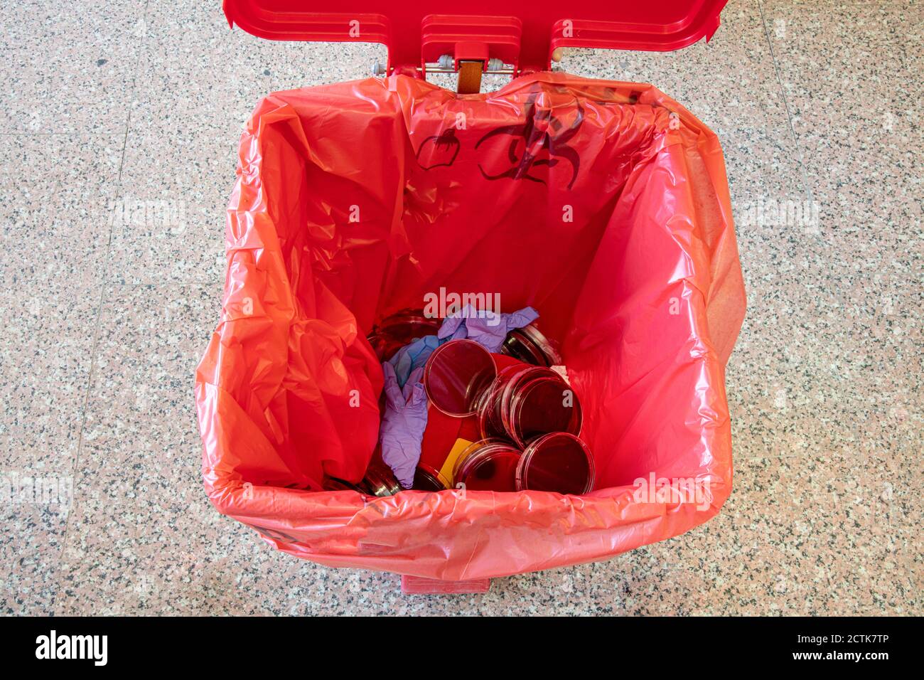 Medical waste bucket. Medical waste, laboratory used petri dishes and ...