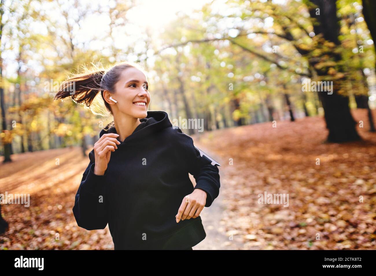Jogging in the forest hi-res stock photography and images - Alamy