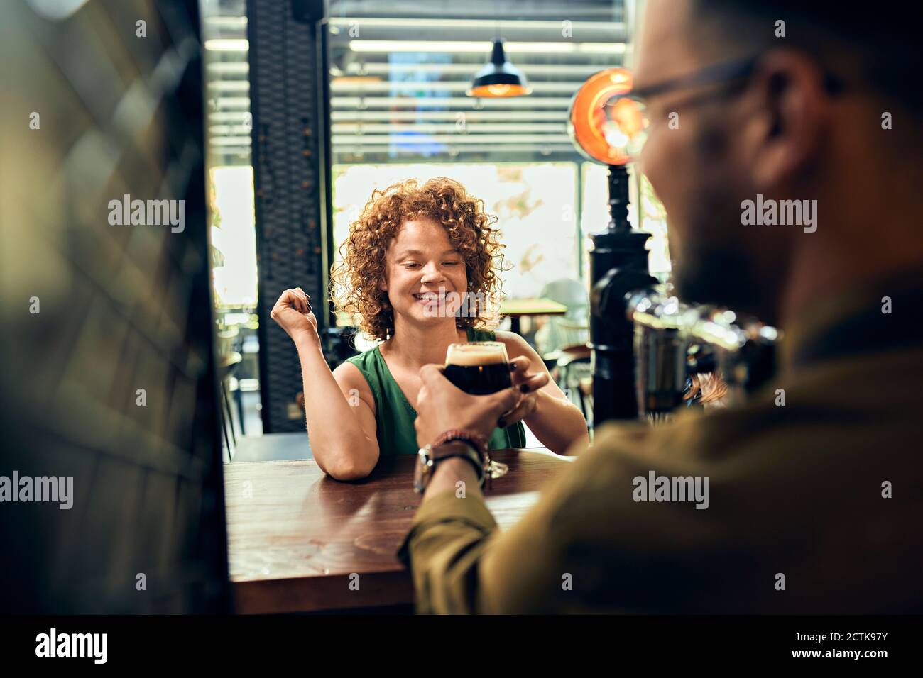 Handing out food hi-res stock photography and images - Alamy