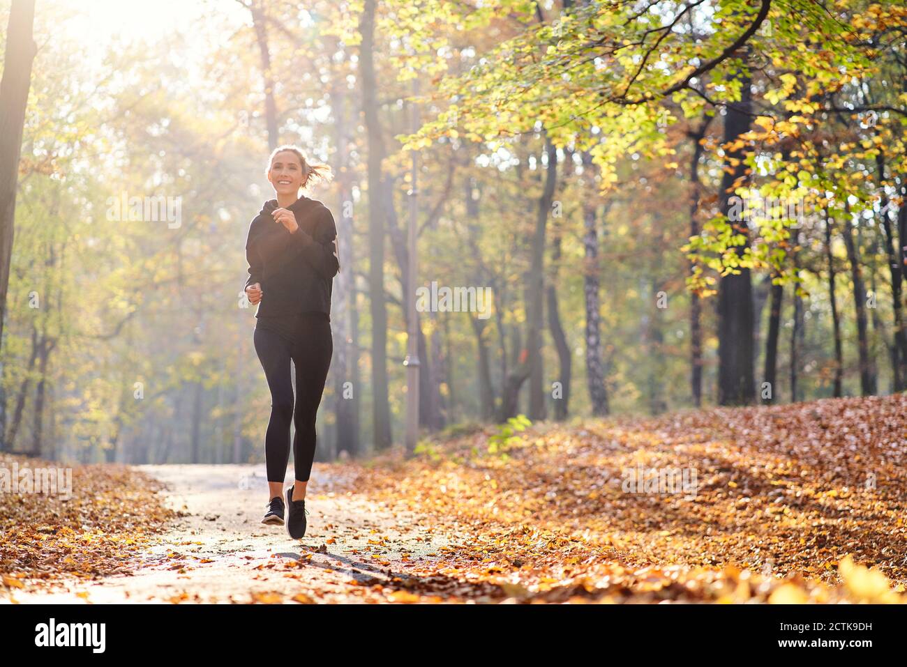 Jogging in the forest hi-res stock photography and images - Alamy
