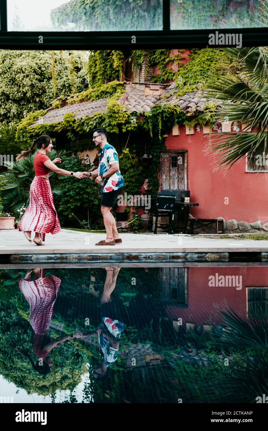 Man dancing swimming pool hi-res stock photography and images - Alamy