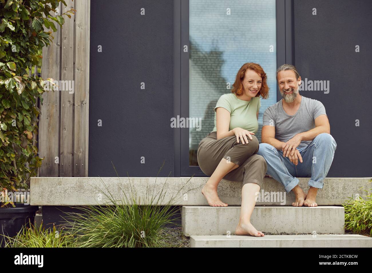 Sitting on steps outside hi-res stock photography and images - Alamy