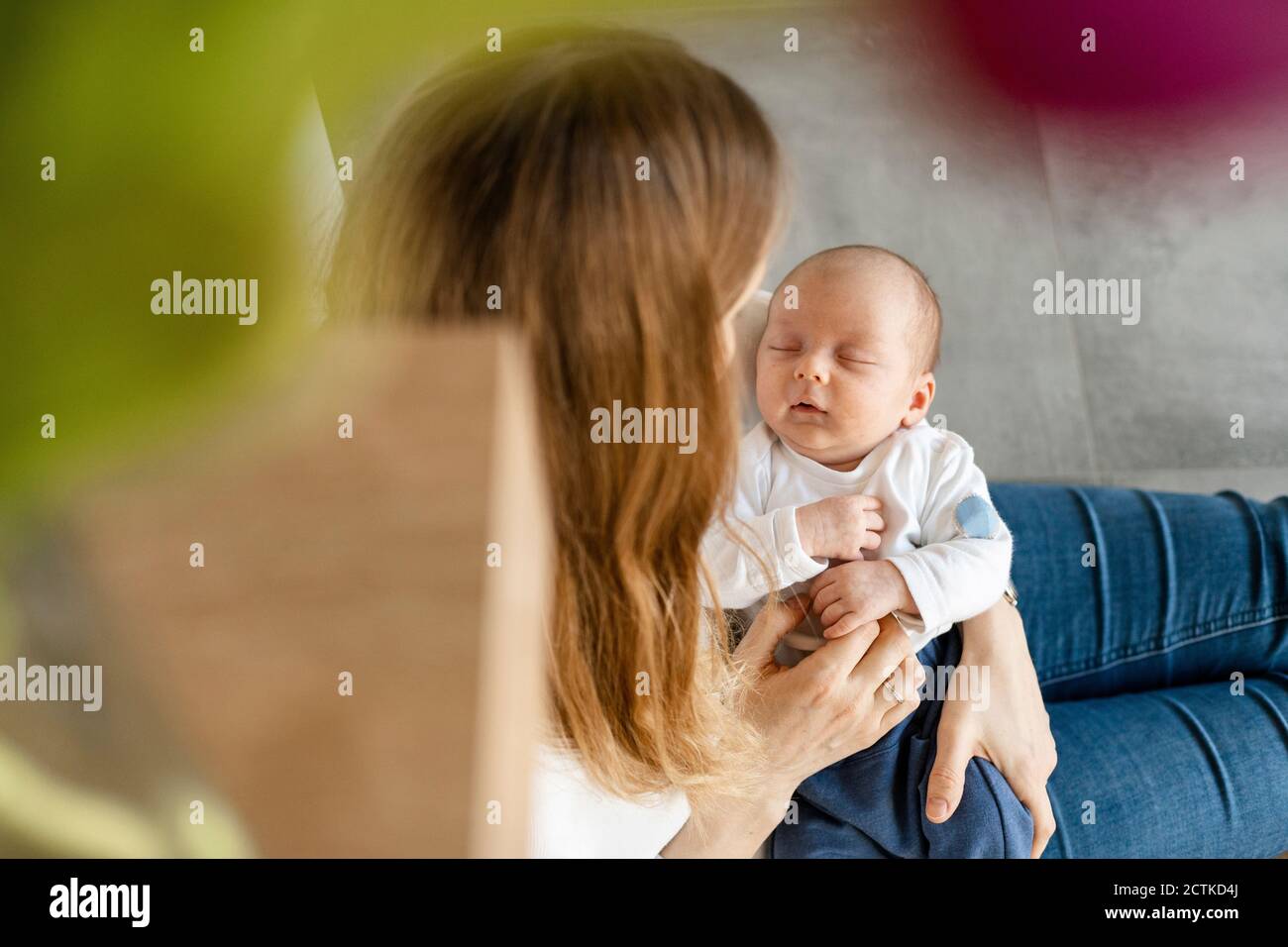 Sleeping on arm hi-res stock photography and images - Alamy