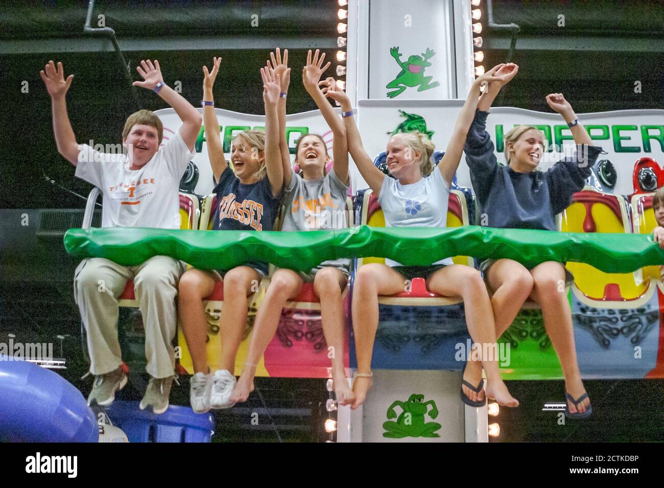 Carnival ride thrill teen teens teenager teenagers hi-res stock ...