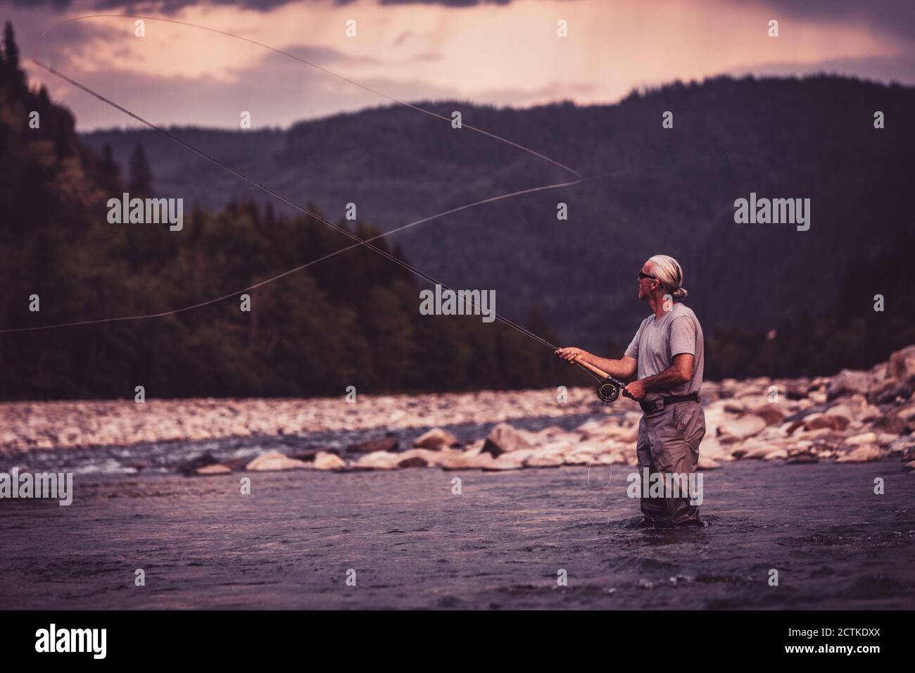 Three mature men fishing hi-res stock photography and images - Alamy