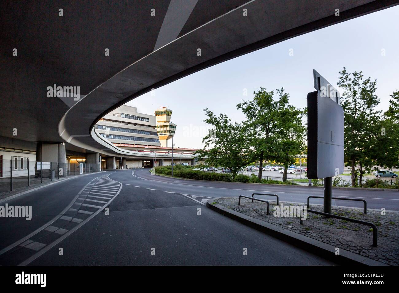 Germany, Berlin, Overpass and empty asphalt road of Berlin Tegel ...