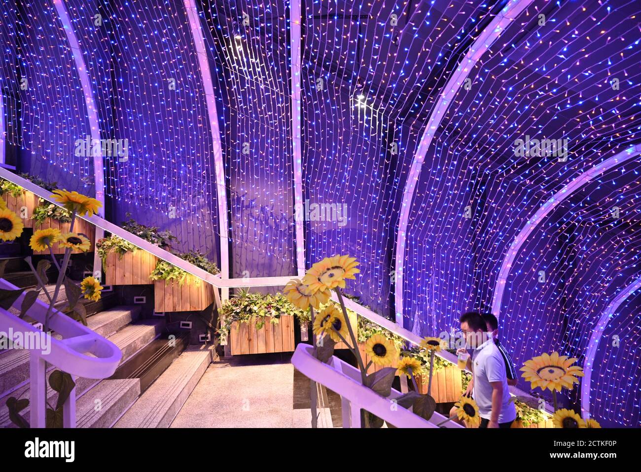 View of the LED-lighted rainbow tunnel at a subway station in Nanning ...