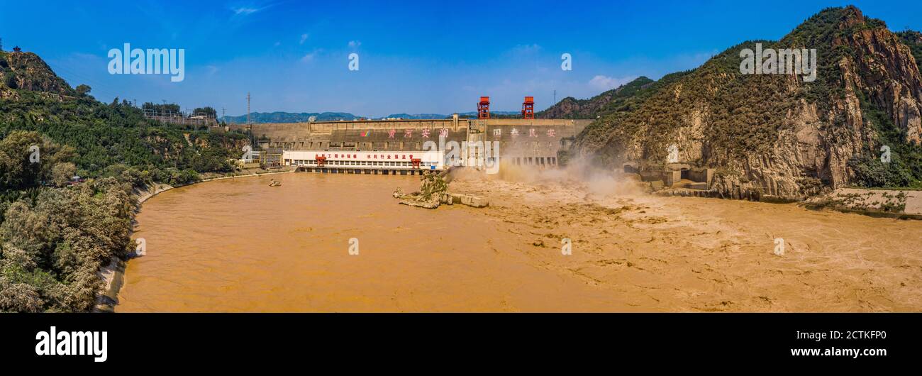 Aerial view of Sanmenxia Dam discharging water due to the flood peak at ...