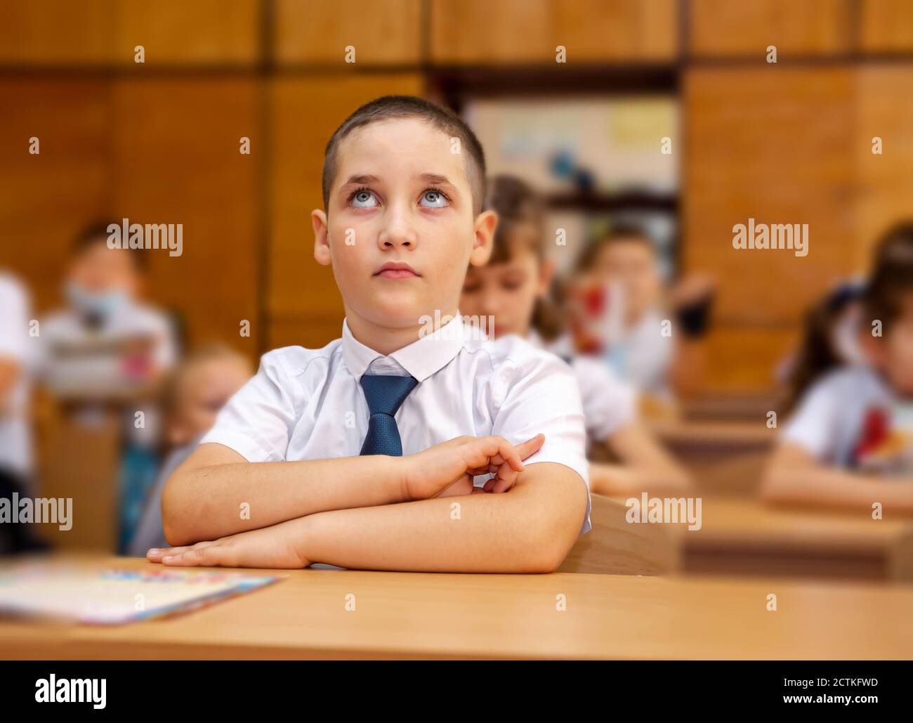 Student boy doing test at the elementary school during the lesson Stock ...