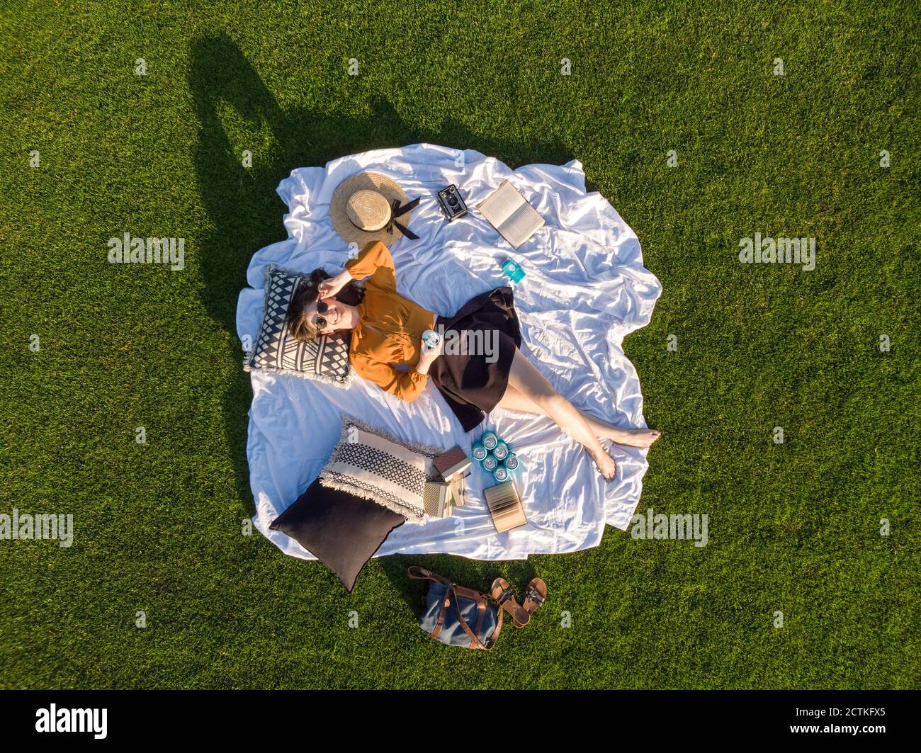 Woman laying grass field hi-res stock photography and images - Alamy