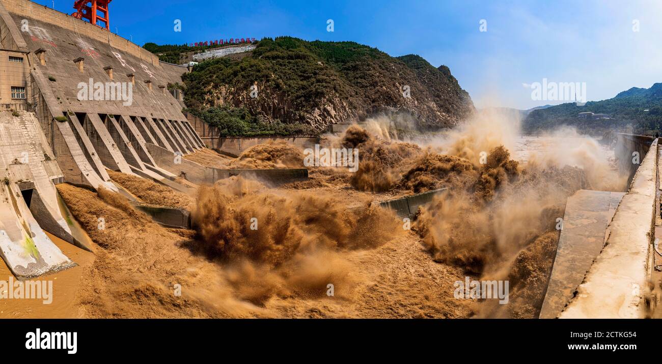 Aerial view of Sanmenxia Dam discharging water due to the flood peak at ...