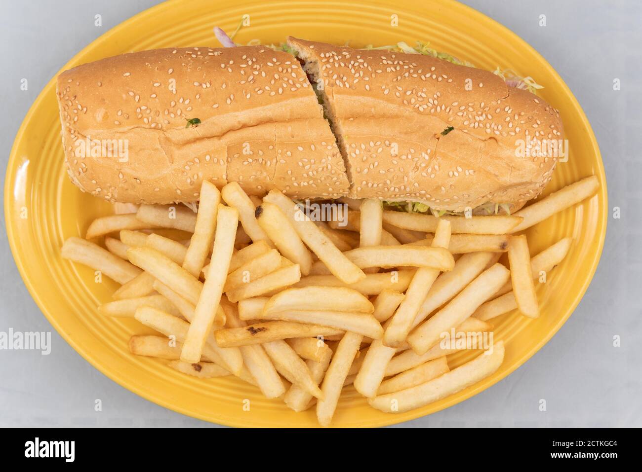 Overhead view of healthy serving of Italian cold cuts sandwich with ...