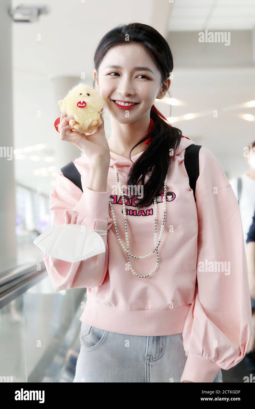 Malaysia singer and actress Joey Chua arrives at a Shanghai airport ...