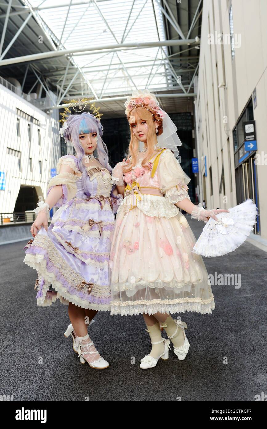 Cosplayers dress up as figures from animations, comics, and games ...
