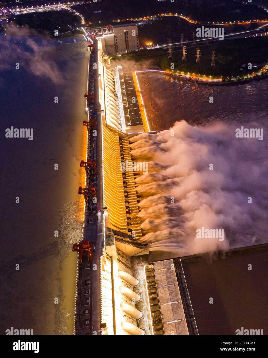 An aerial view of the Three Gorges Dam discharging water with 11 ...