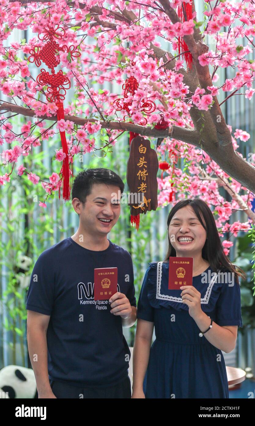 Chinese young couples register for marriage at the civil affairs office ...