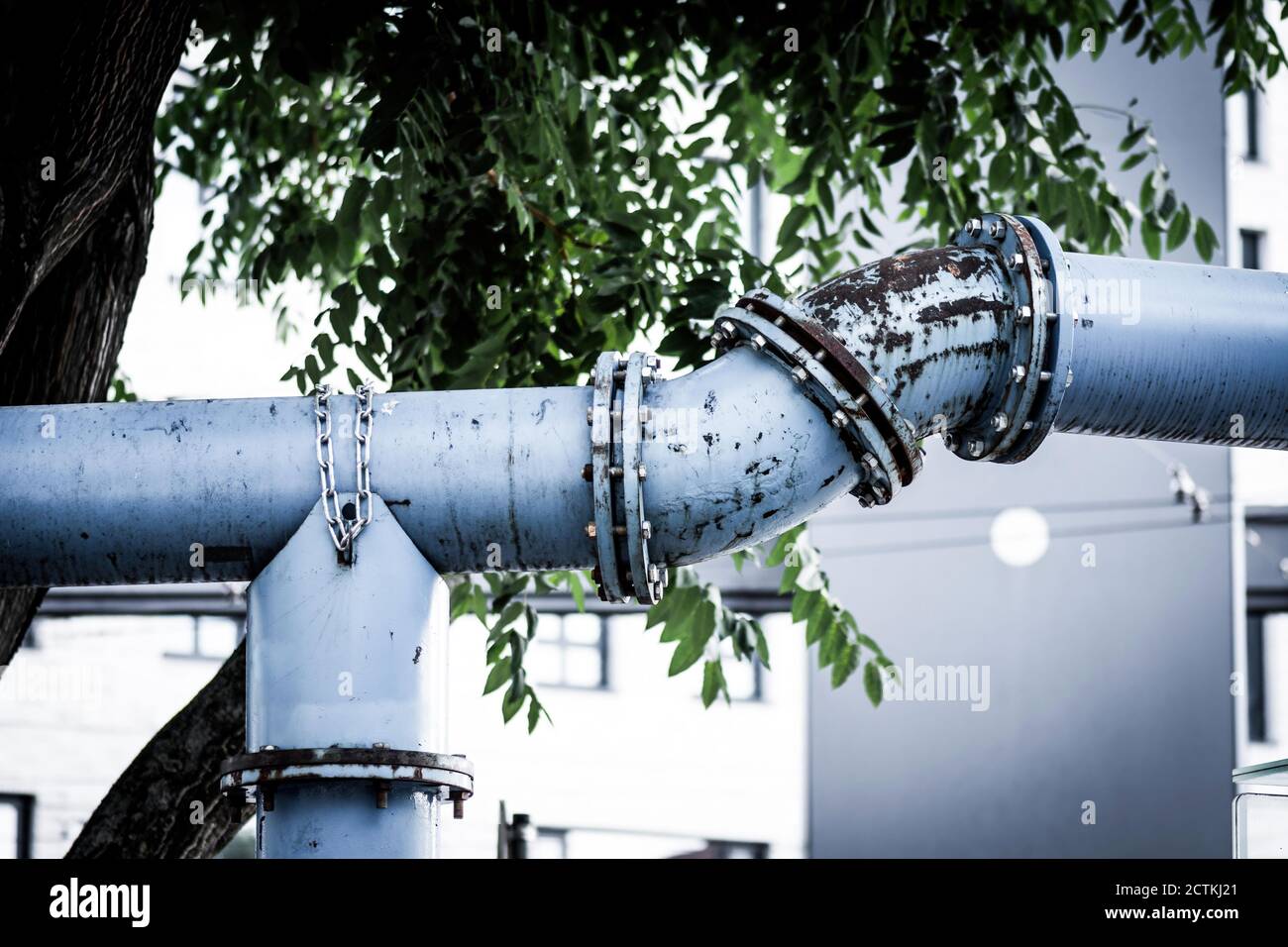 View of a rustic water pipeline Stock Photo - Alamy