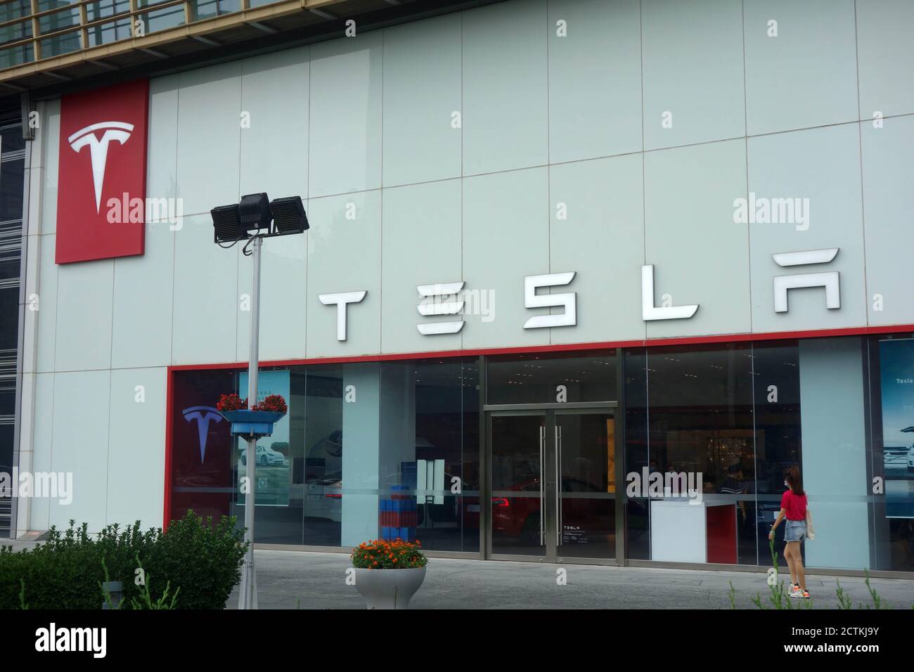 The fa ade of the experience center at the Tesla China headquarters in ...