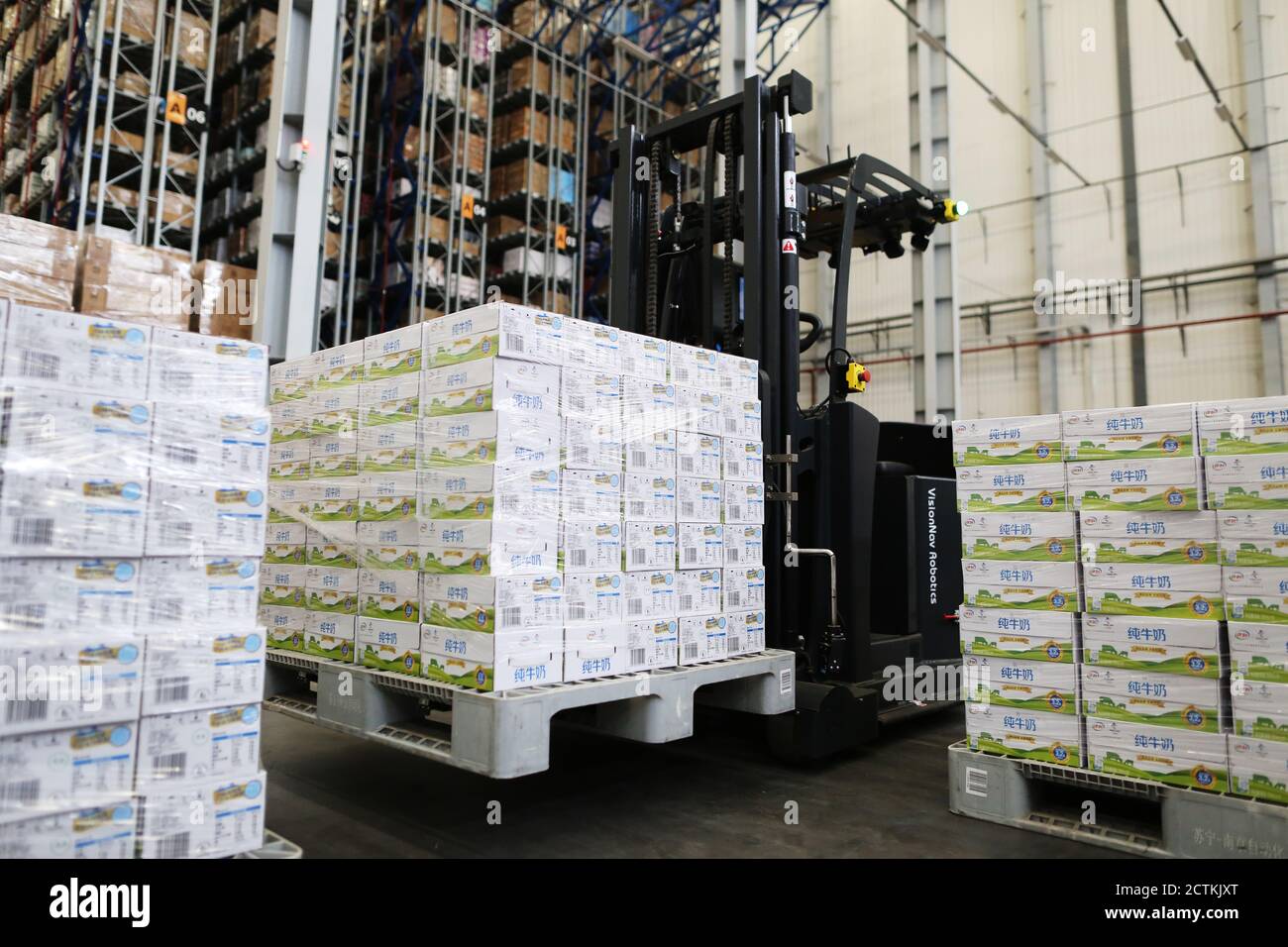 Inside view of robots working at a Suning unmanned 5G storage house in ...