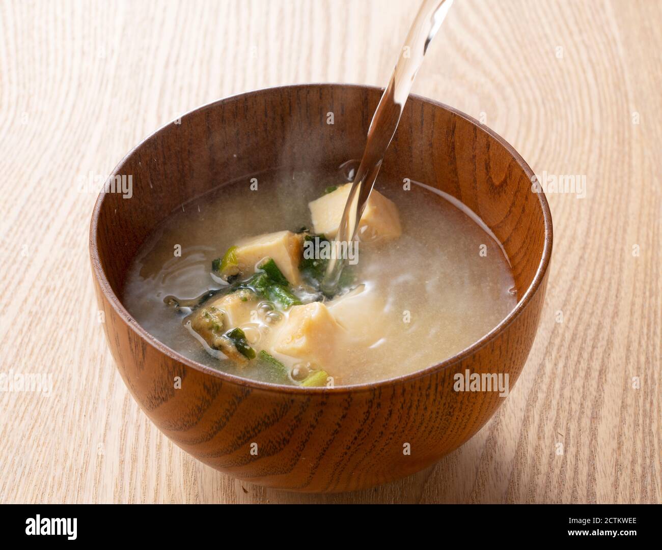 Pour hot water into a bowl of freeze-dried miso soup Stock Photo - Alamy