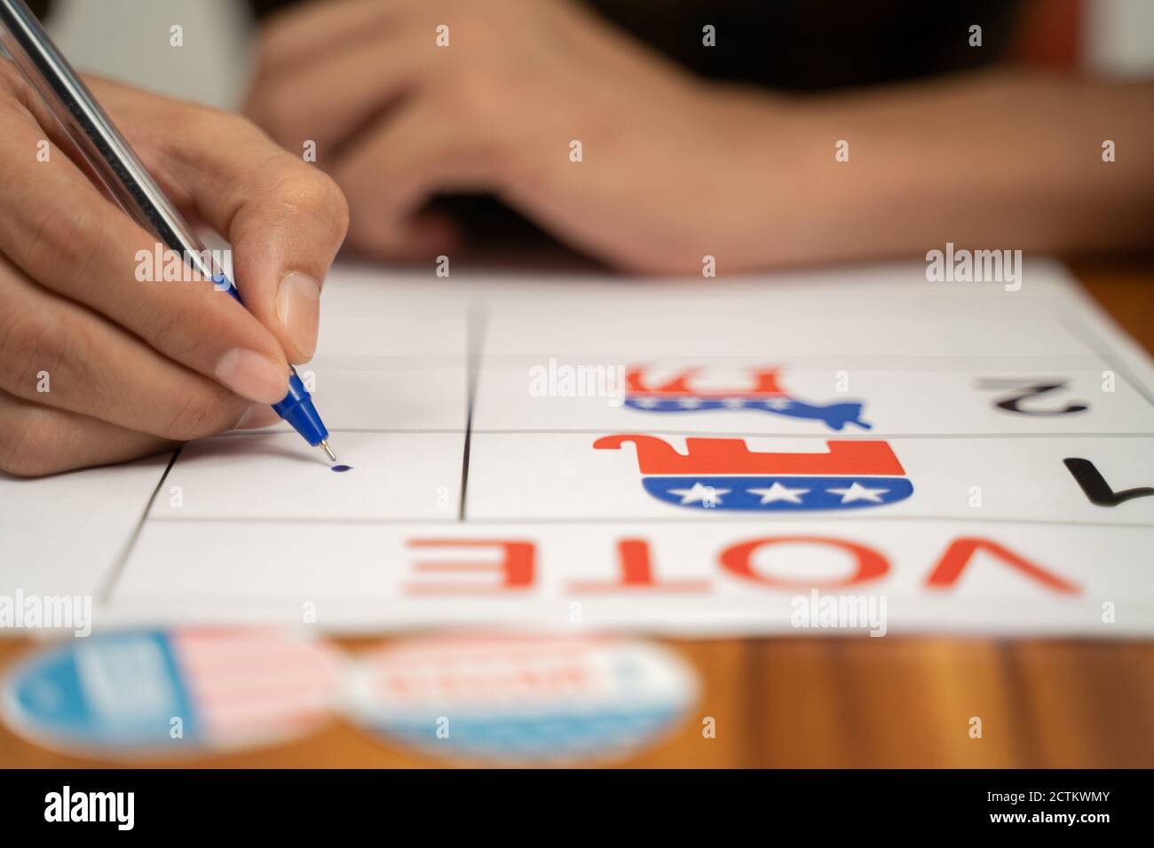Usa voting booth hands hi-res stock photography and images - Alamy