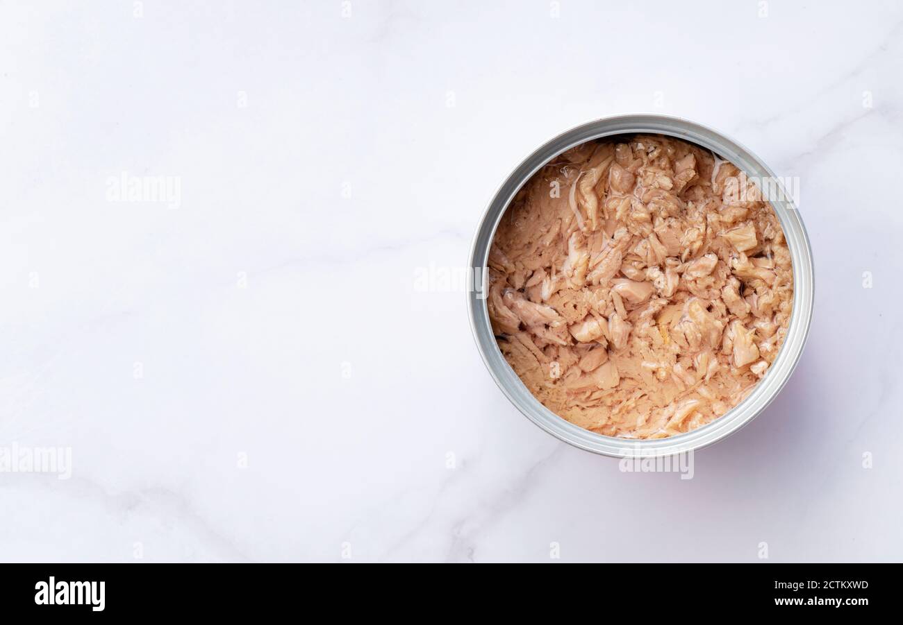 Canned tuna on the marble Stock Photo - Alamy