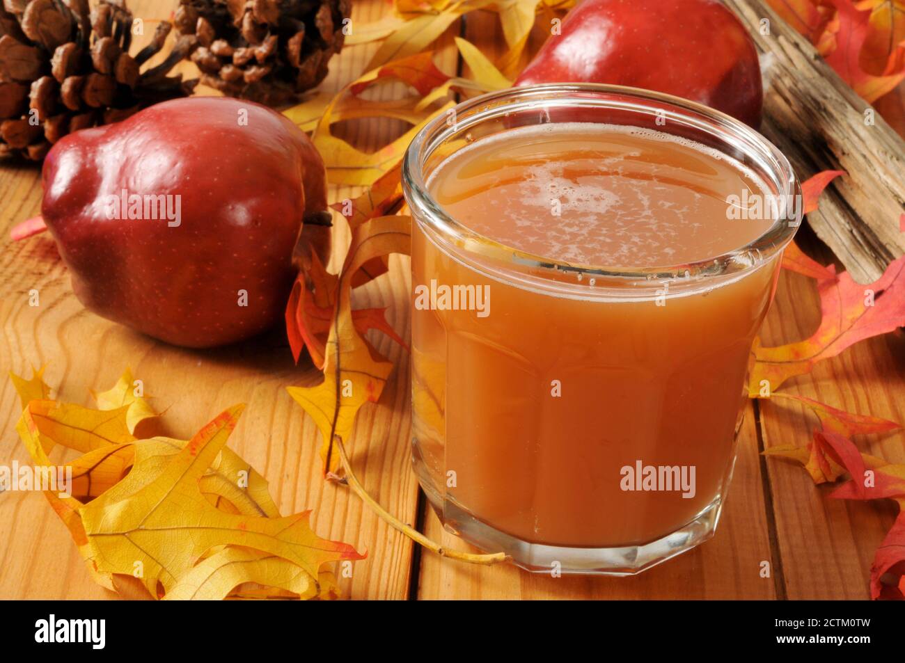 Fresh, unfiltered organic apple juice on a harvest setting Stock Photo ...