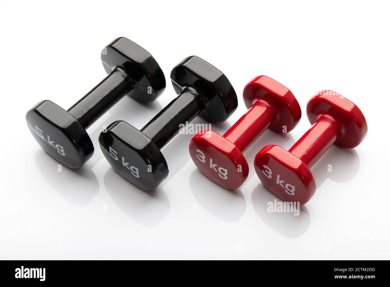 Fitness group people lifting dumbbell hi-res stock photography and ...