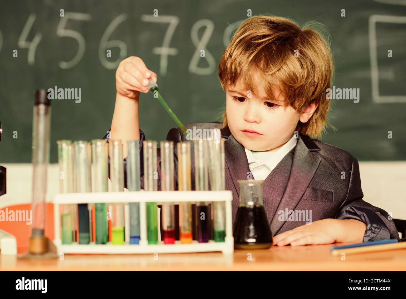 little boy at lesson. Back to school. biology science. science ...