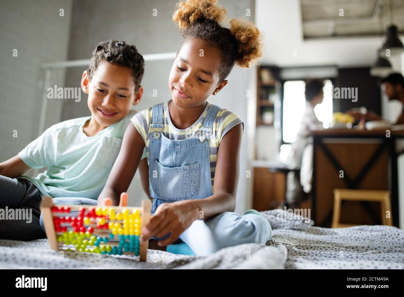 Children, education, plyaing happiness concept. Happy kids entertaining ...