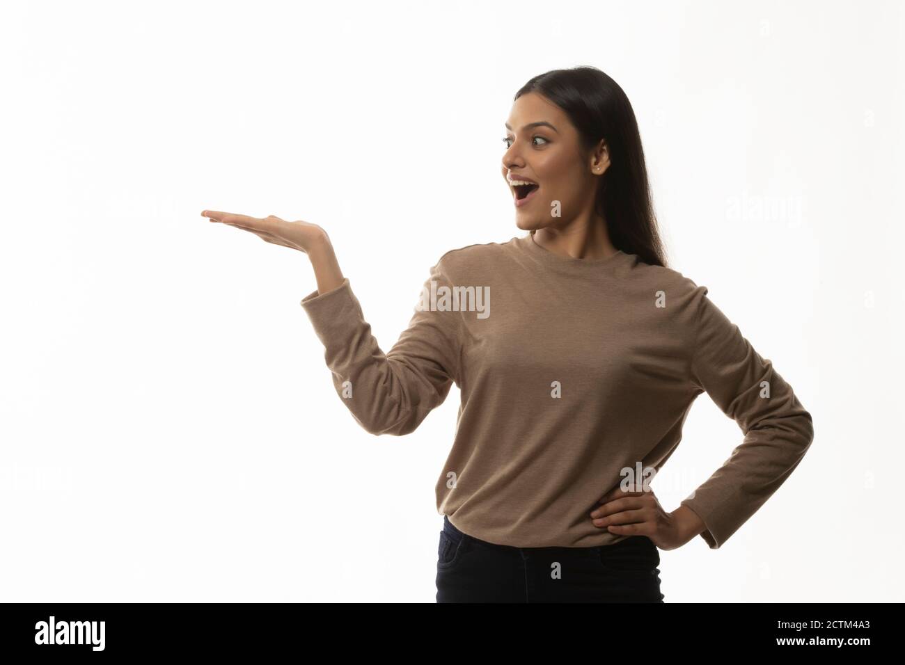 Looking at her hand hi-res stock photography and images - Alamy