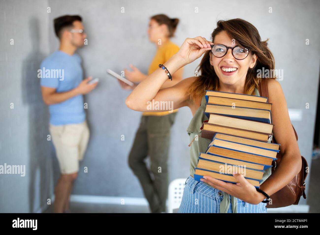 People, knowledge, education and school concept. Happy student girl ...