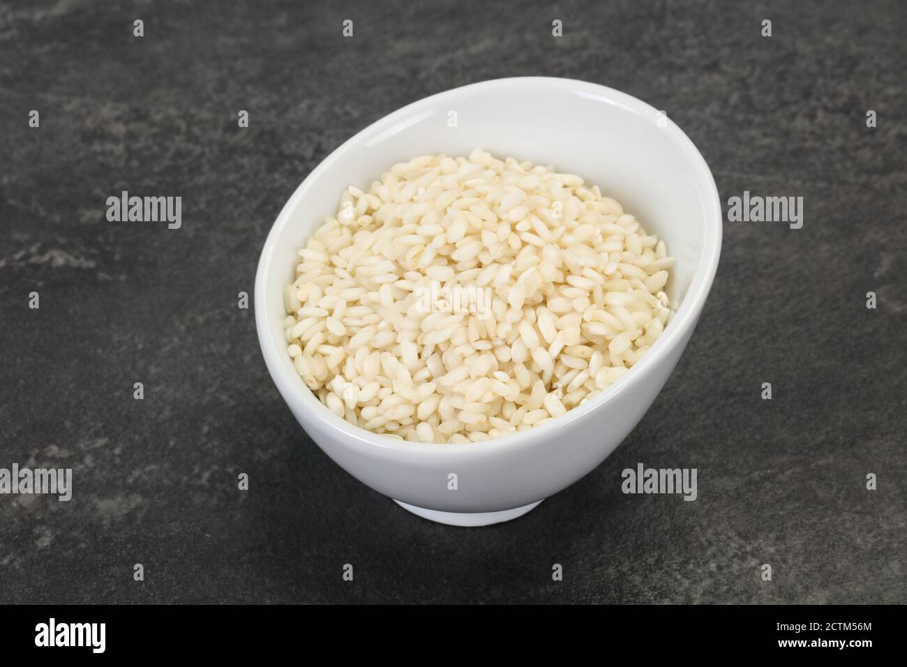 Raw Arborio rice for Italian risotto Stock Photo - Alamy