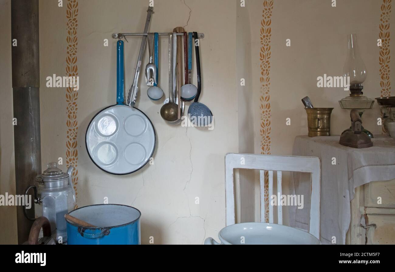 Very antique old kitchen with cookware inside a traditional Czech home ...