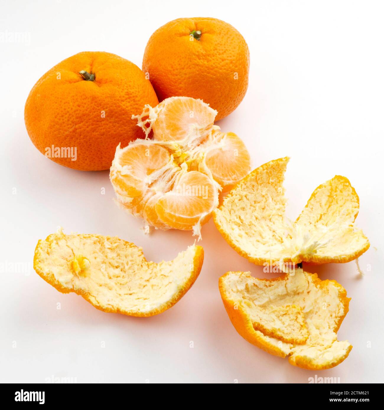 Whole half mandarin orange reflection hi-res stock photography and ...