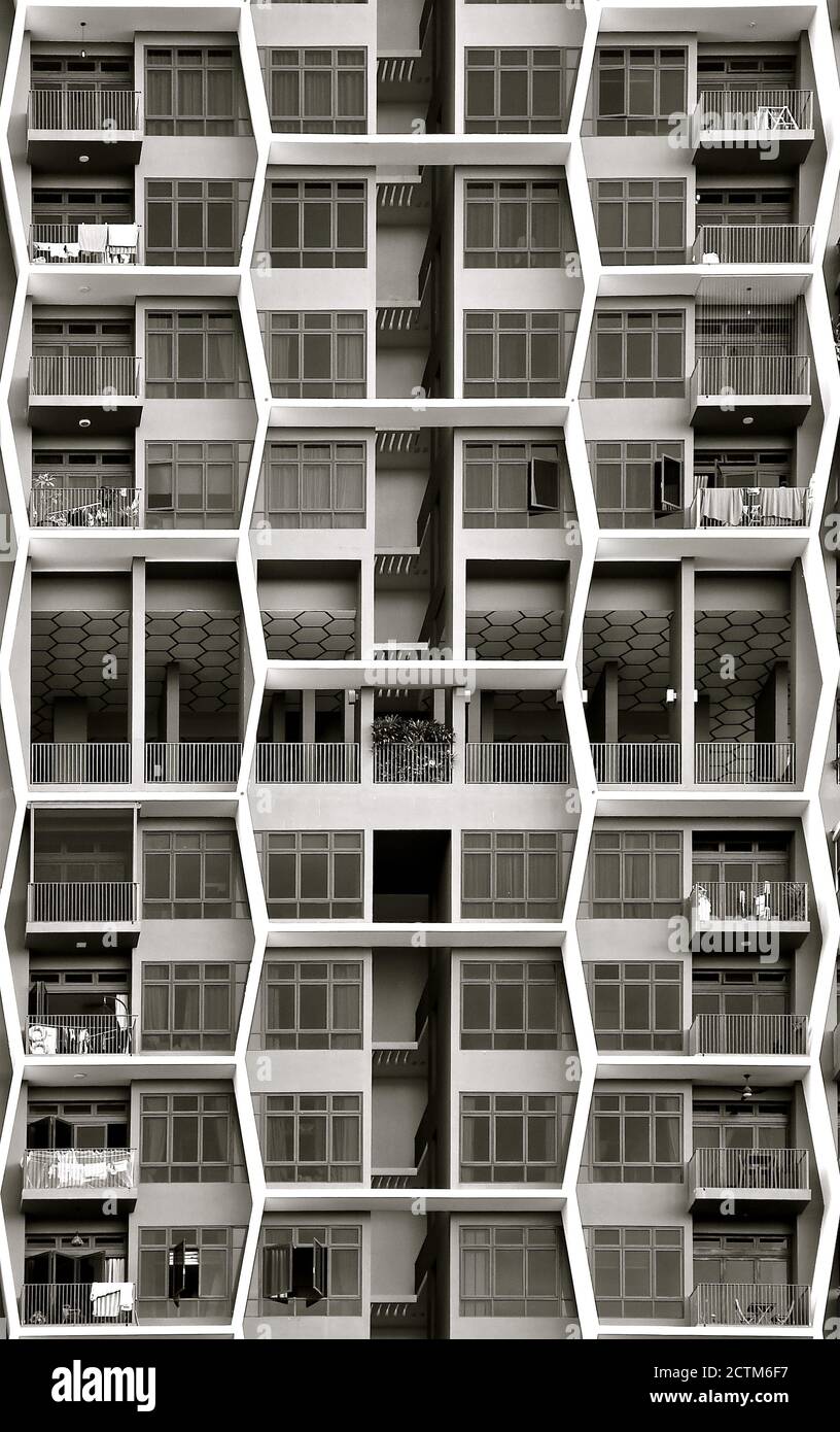 A modern apartment block with hexagonal honeycomb designs on the facade ...