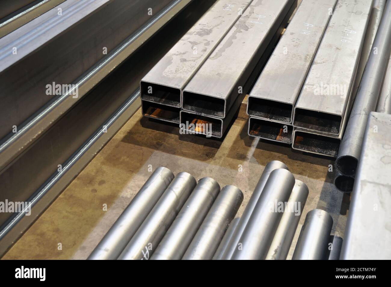Steel pipe at a metalwork plant. Blanks for the manufacture of ...