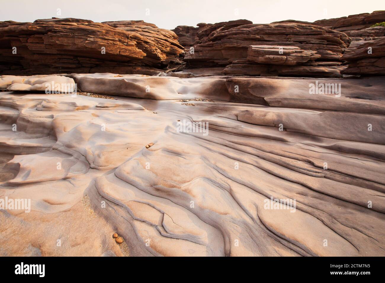 Abstract ripples of steep sedimentary sandstone on Mekong River in ...
