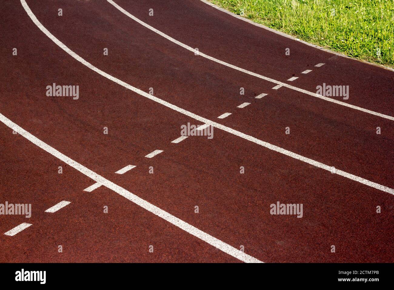 Red running track at the stadium. Start concept Stock Photo - Alamy