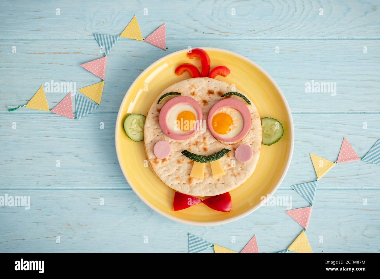 Funny breakfast for kids with face shape sandwich Stock Photo - Alamy