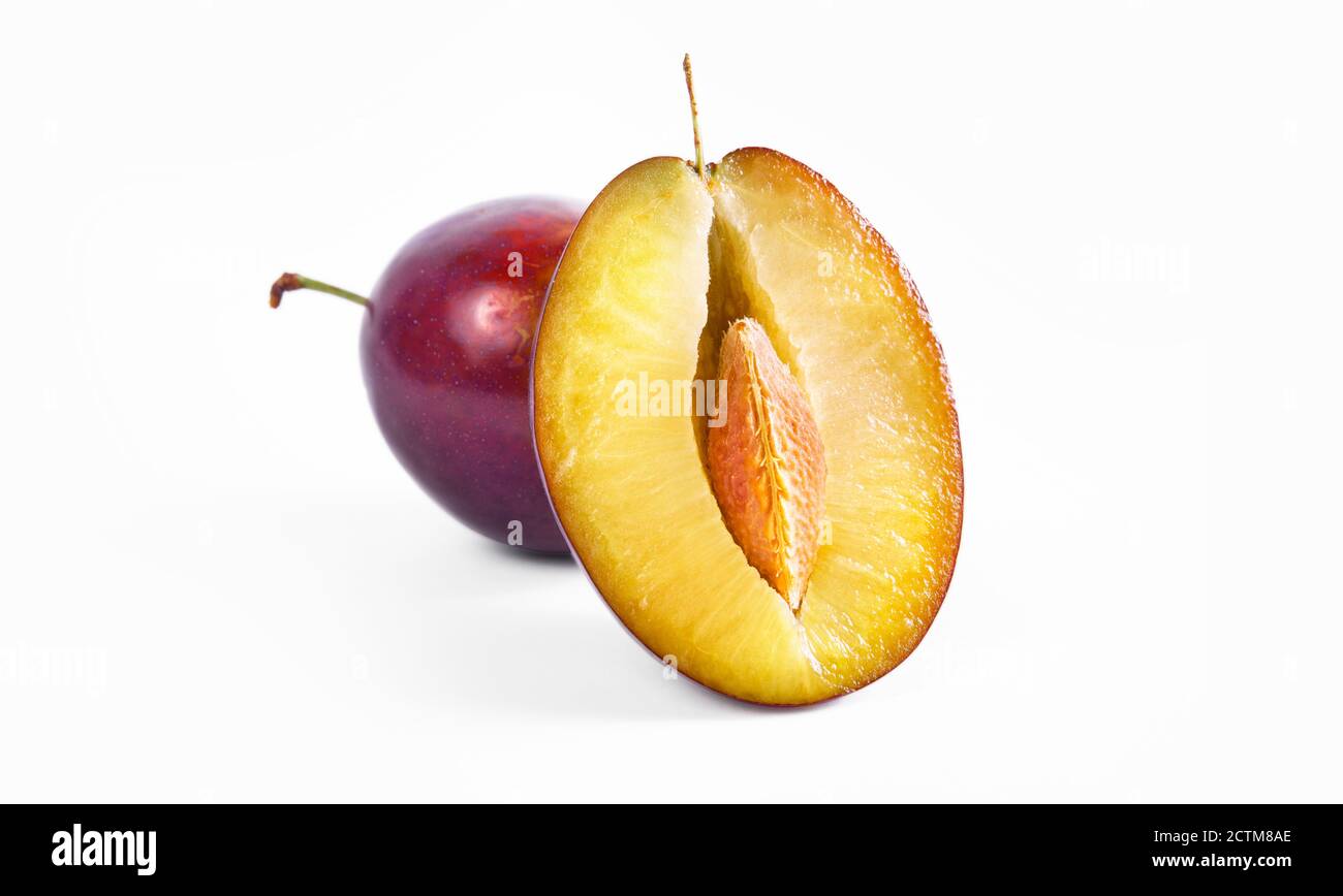 Plum half close up macro shot. Oragnic sweet plums fresh and delicious ...