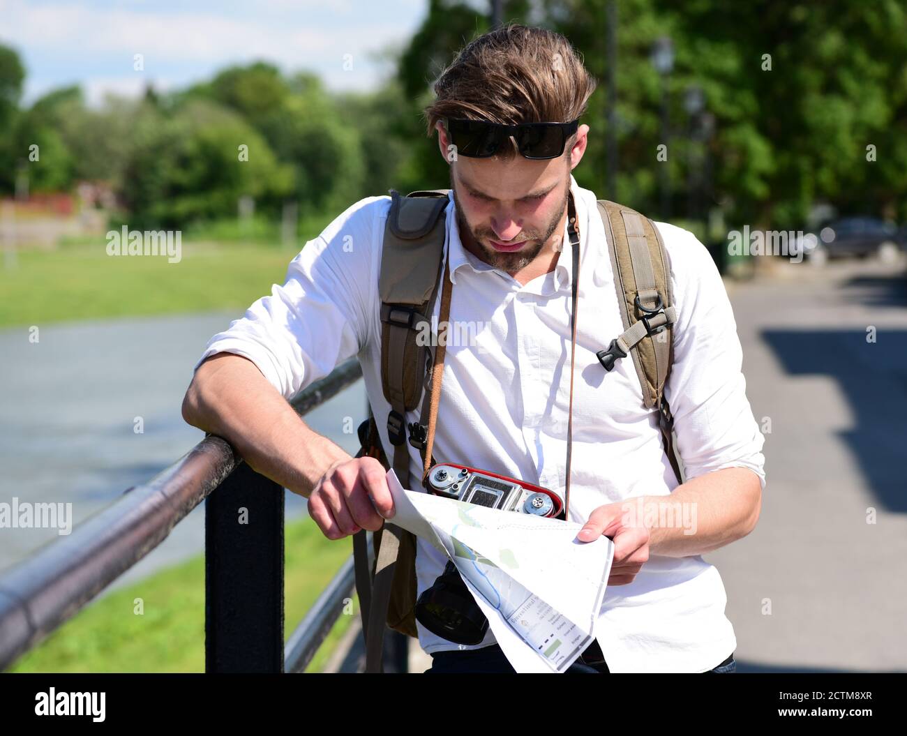 Discovering new places concept. Man with backpack and sunglasses ...