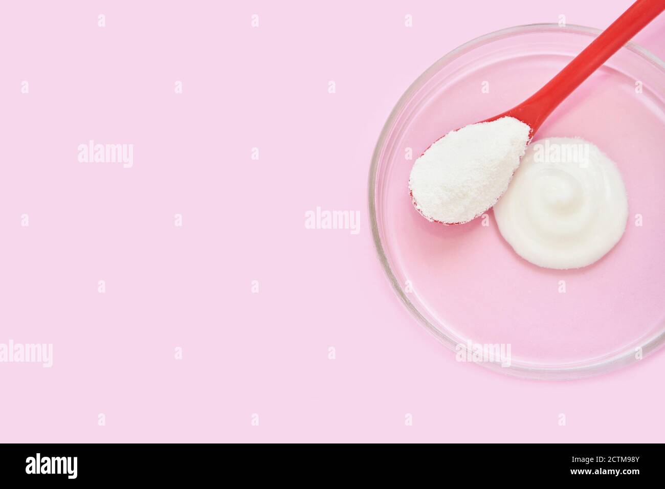Collagen white powder. Pastel color background. Health product Stock ...