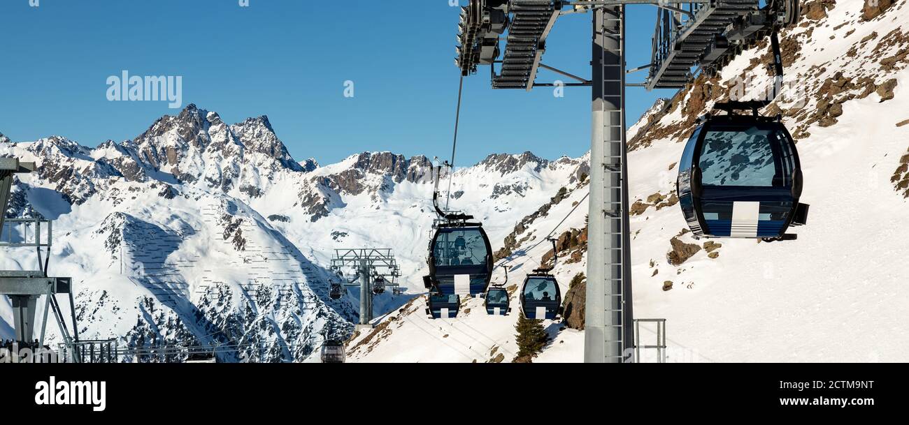 New modern spacious big cabin ski lift gondola pillar against ...