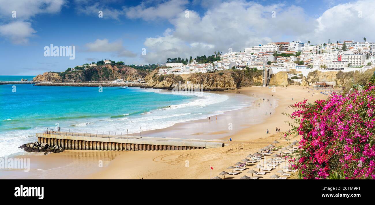 Landscape with old town Albufeira and sandy city beaches in Algarve ...